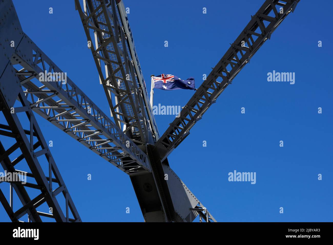 Australian Flag flying on top of Storey Bridge against blue sky Stock ...