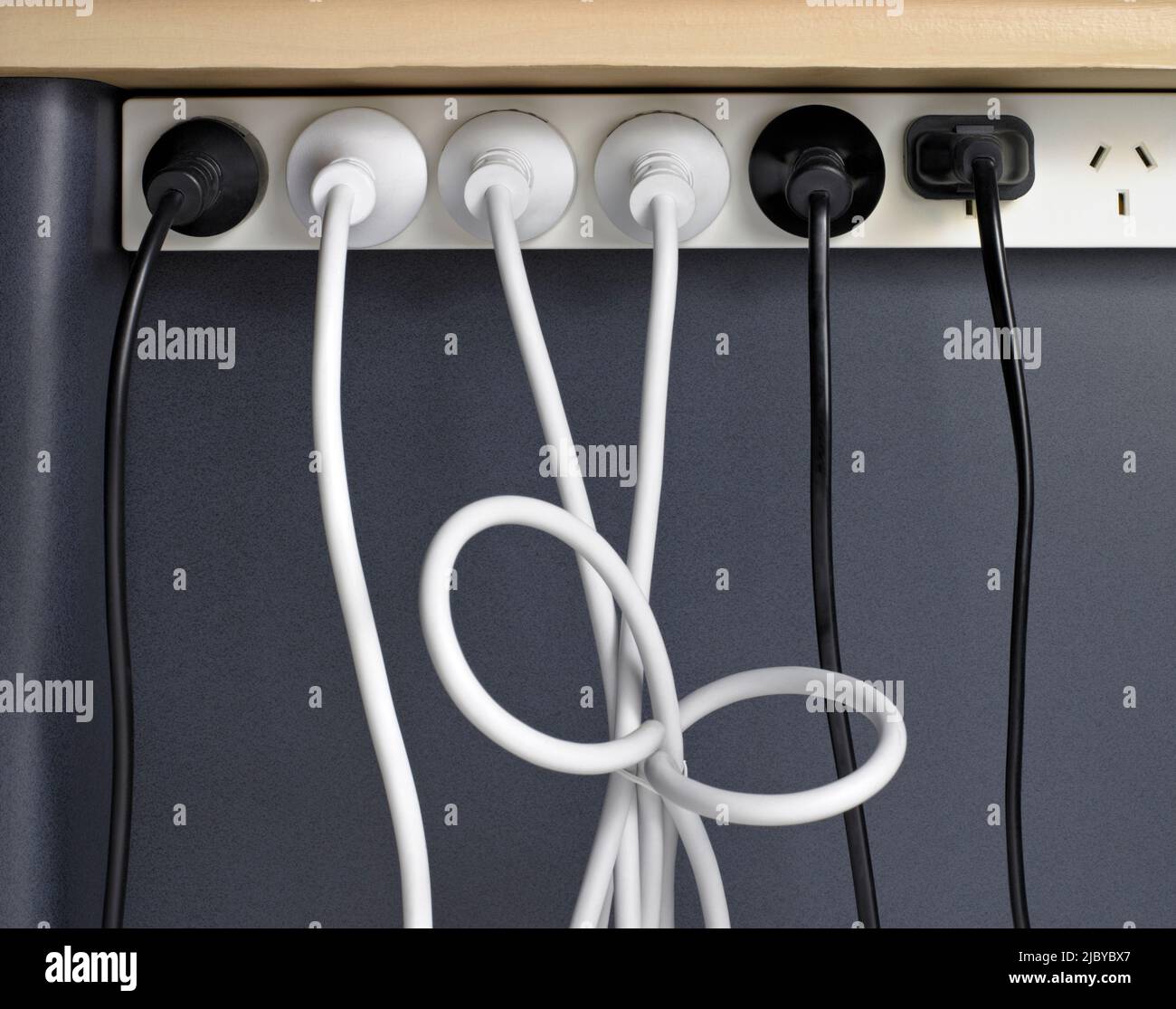 Multiple plugs in mulitle power socket Stock Photo - Alamy