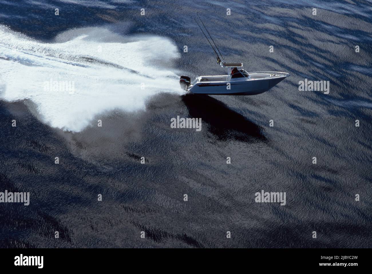 Aerial of speed boat on calm water Stock Photo - Alamy