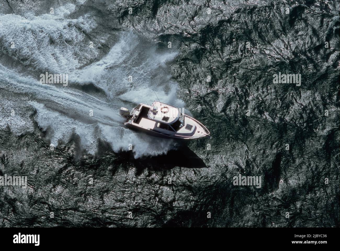 Aerial of speed boat on calm water Stock Photo - Alamy