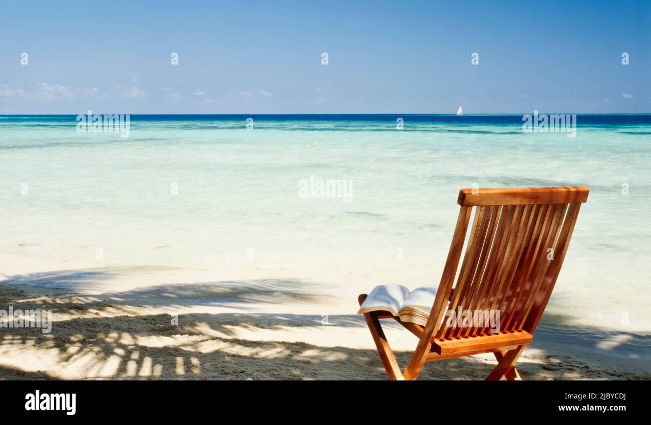 Empty beach chair hi-res stock photography and images - Alamy