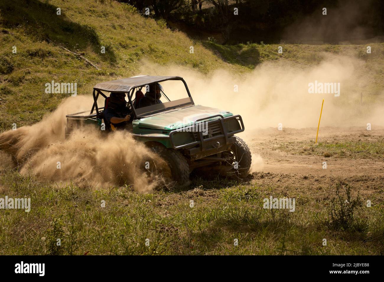 Four Wheel Drive vehicles racing on extreme off road course in ...
