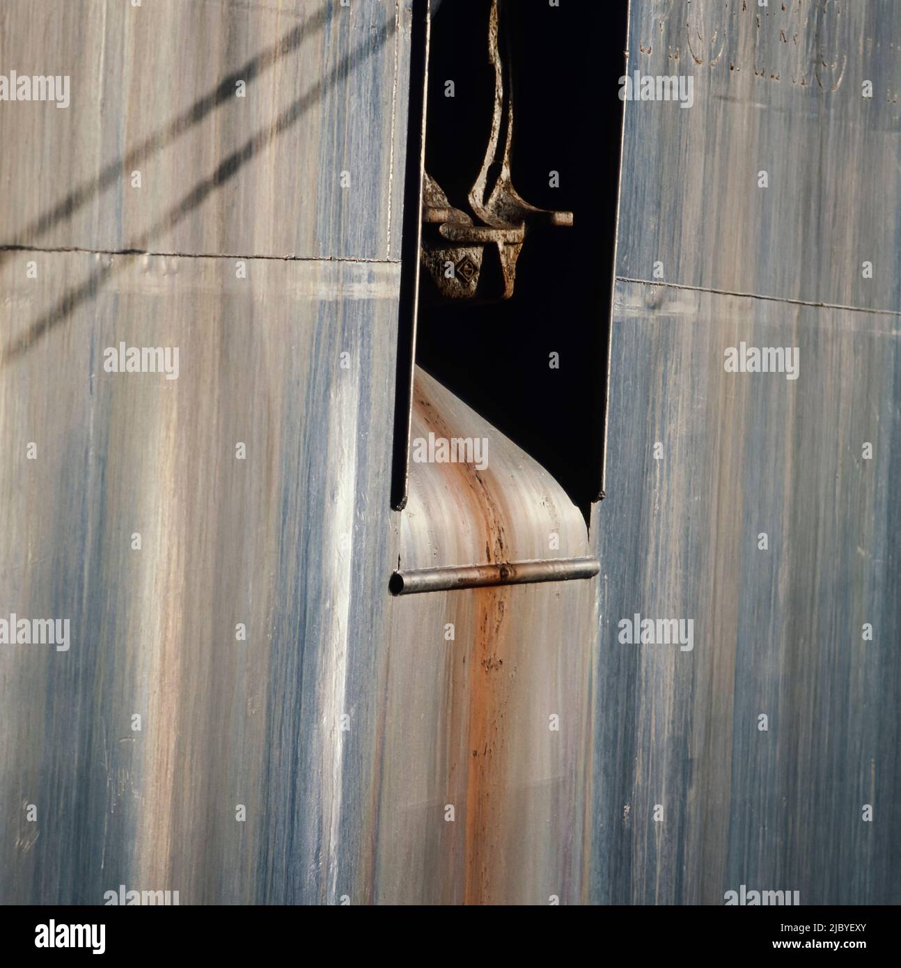 Close up of ship's anchor secured in Hawsehole in hull of the Ship ...