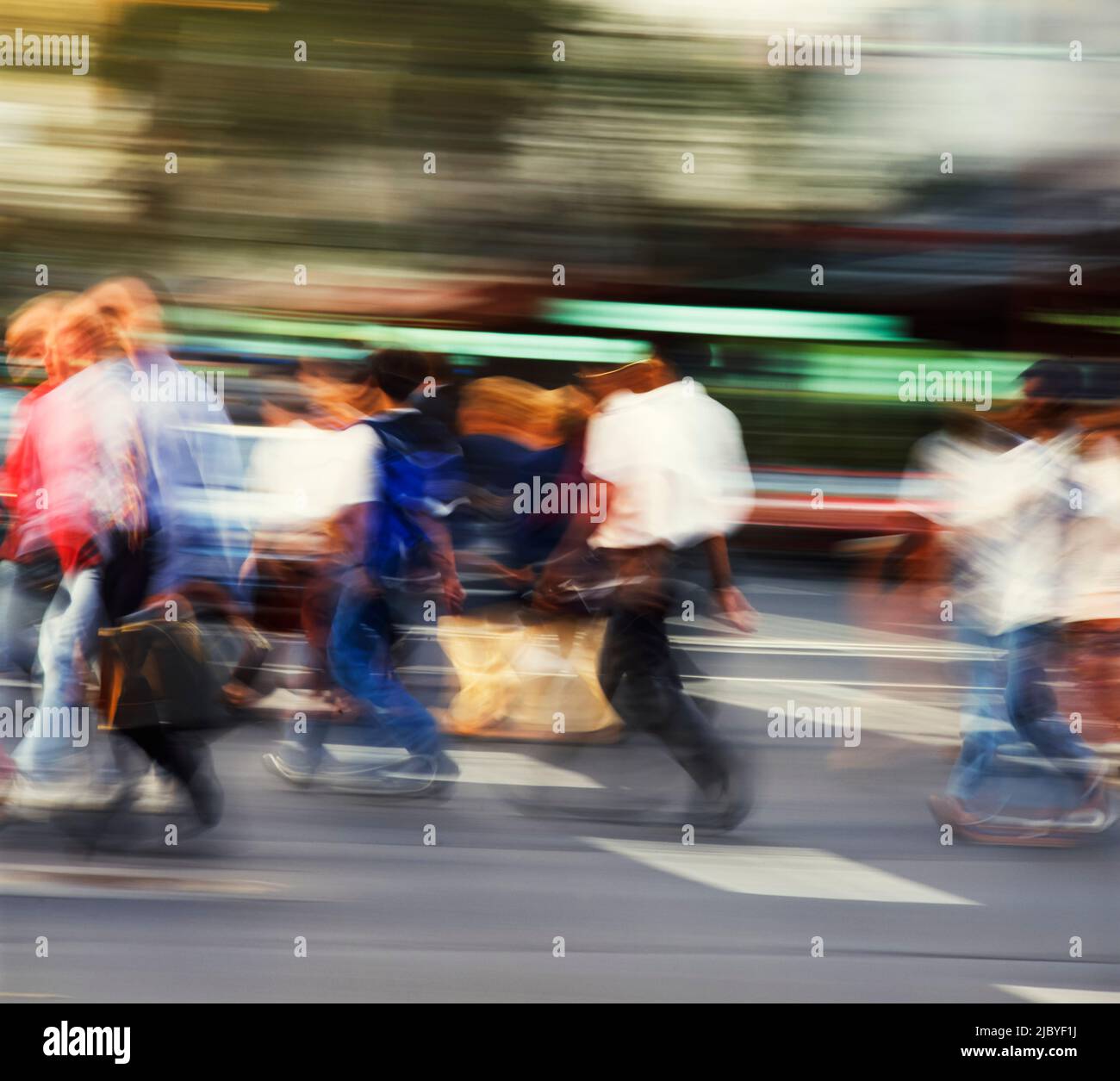 People crossing intersection on city street Stock Photo - Alamy