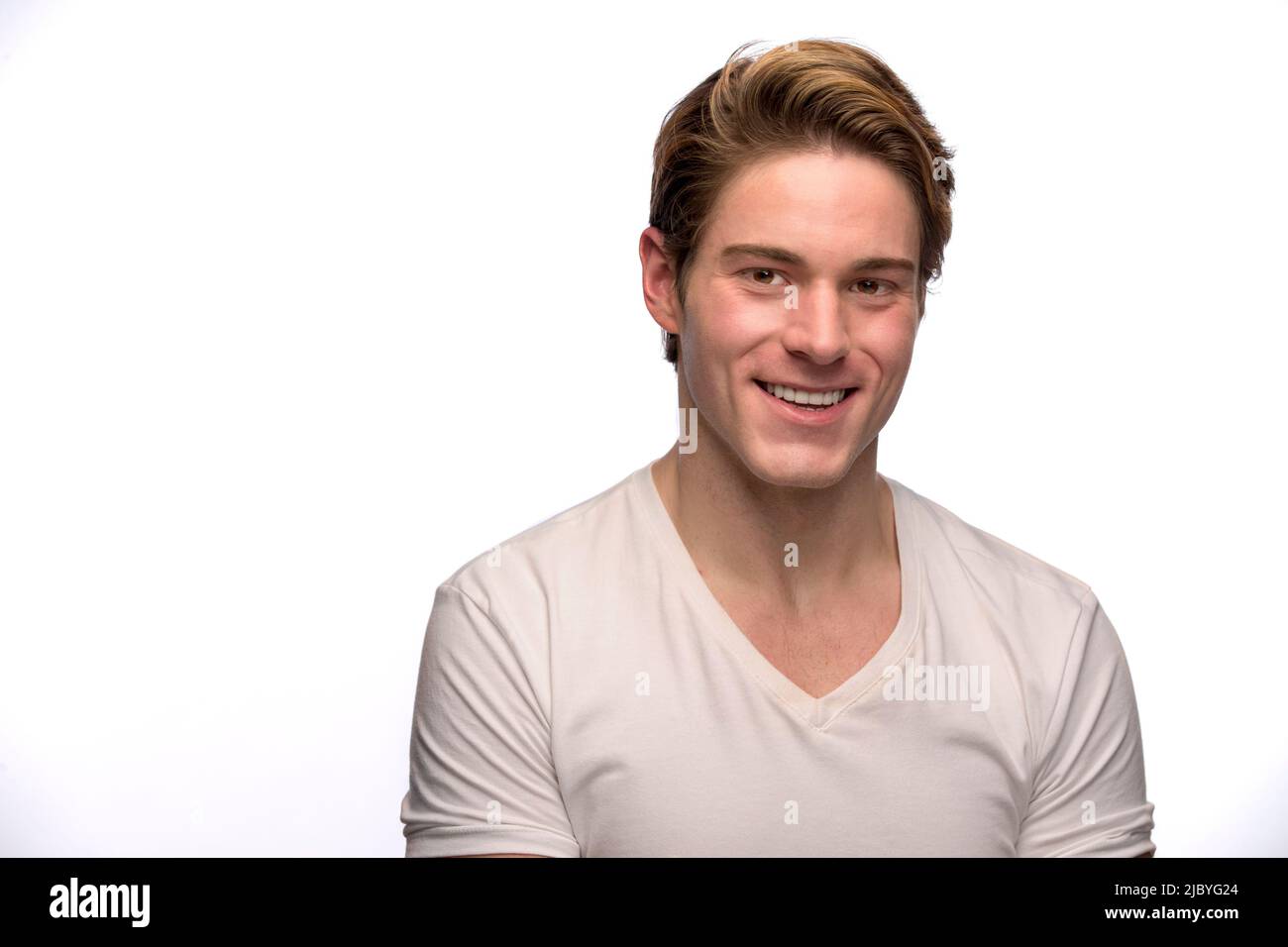 Young casual man smiling camera hi-res stock photography and images - Alamy