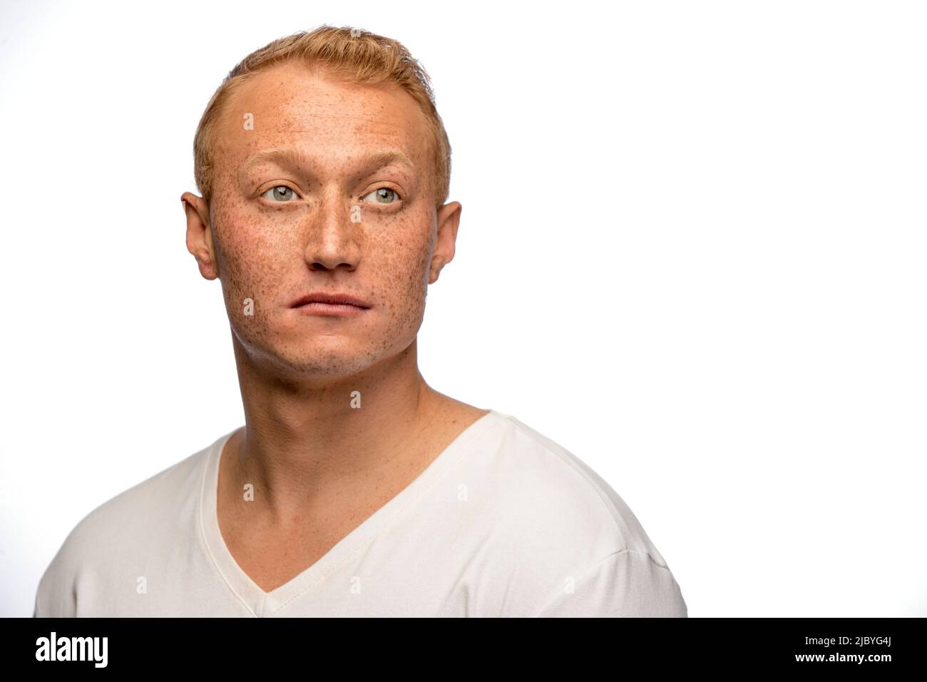 Portrait freckled young man hi-res stock photography and images - Alamy