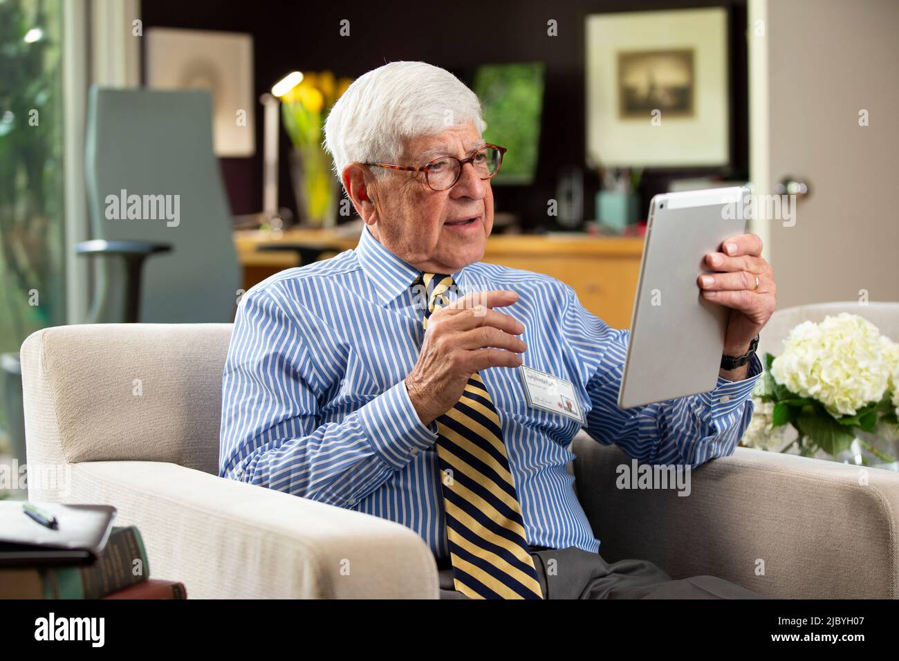 Man video chatting doctor tele hi-res stock photography and images - Alamy