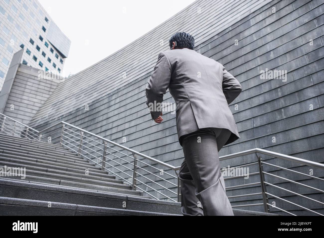 Guy running into building hi-res stock photography and images - Alamy