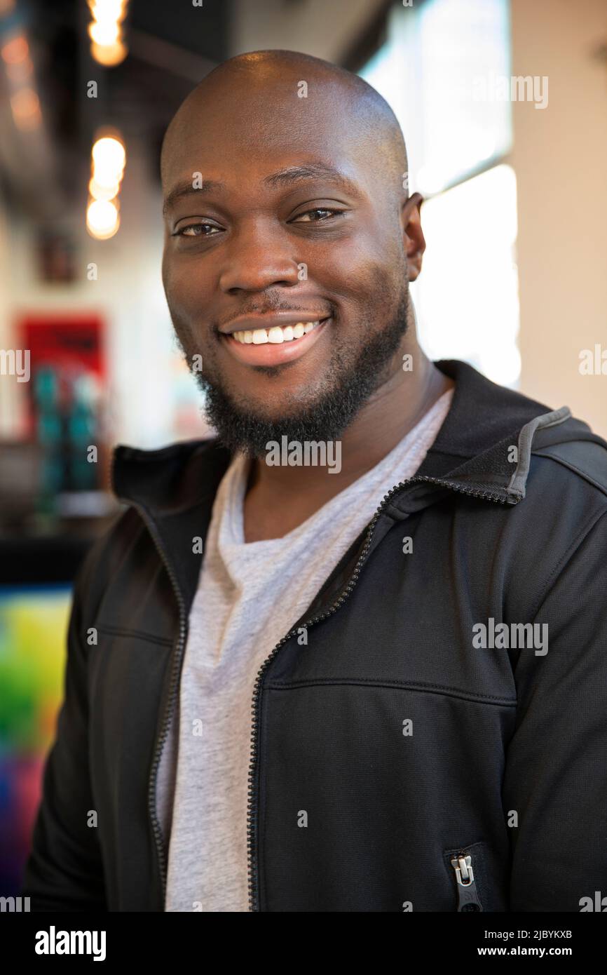 Approachable man smiling hi-res stock photography and images - Alamy