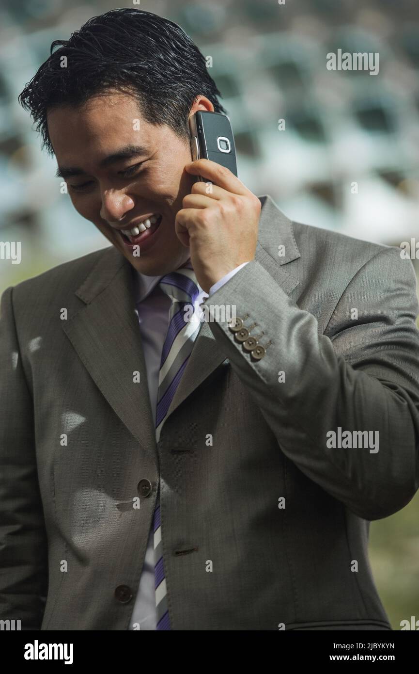 Positive chinese man talking on hi-res stock photography and images - Alamy
