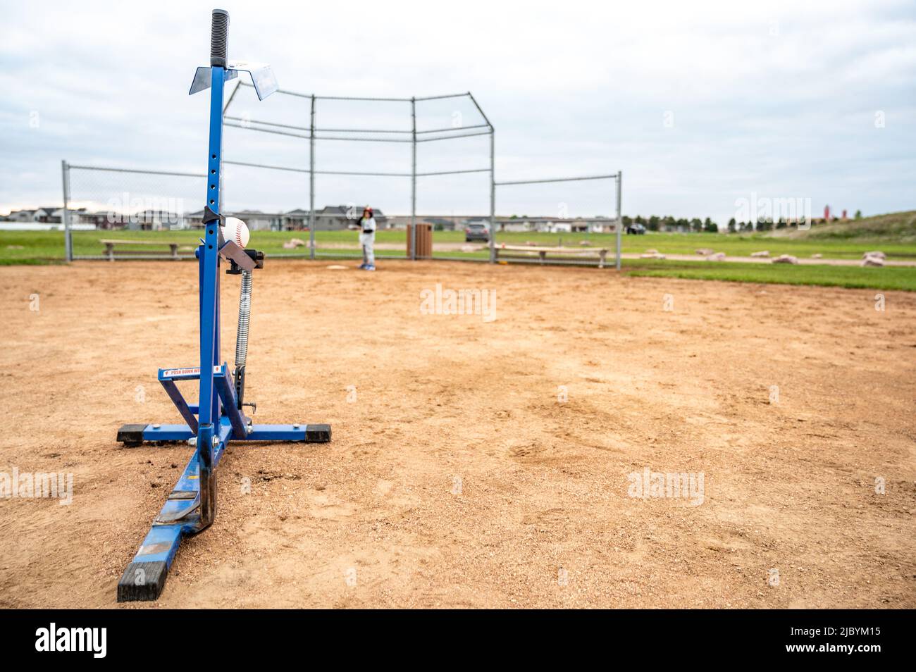 Mechanical youth slow pitching machine used to throw a baseball for ...