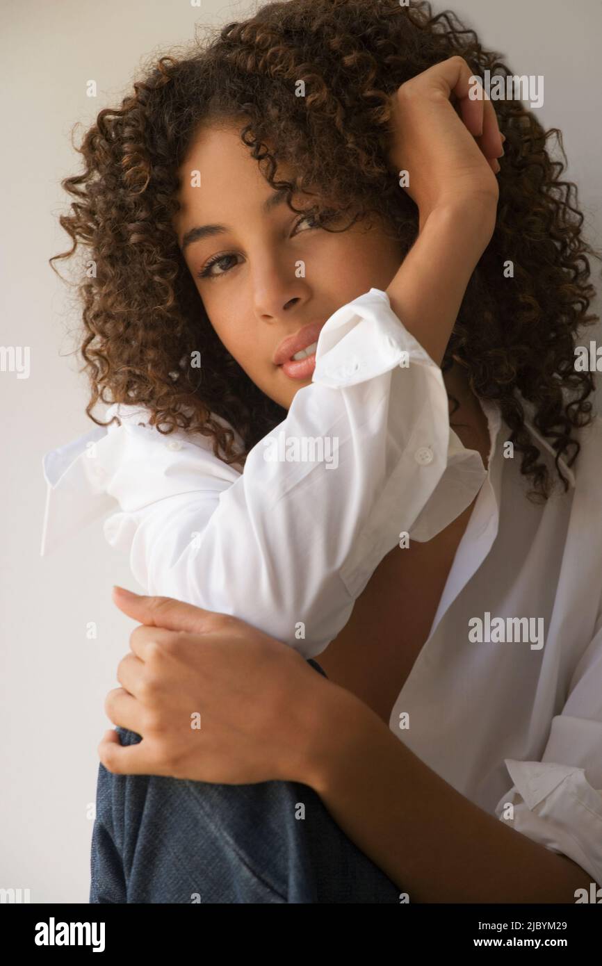 Mixed race woman thinking Stock Photo - Alamy