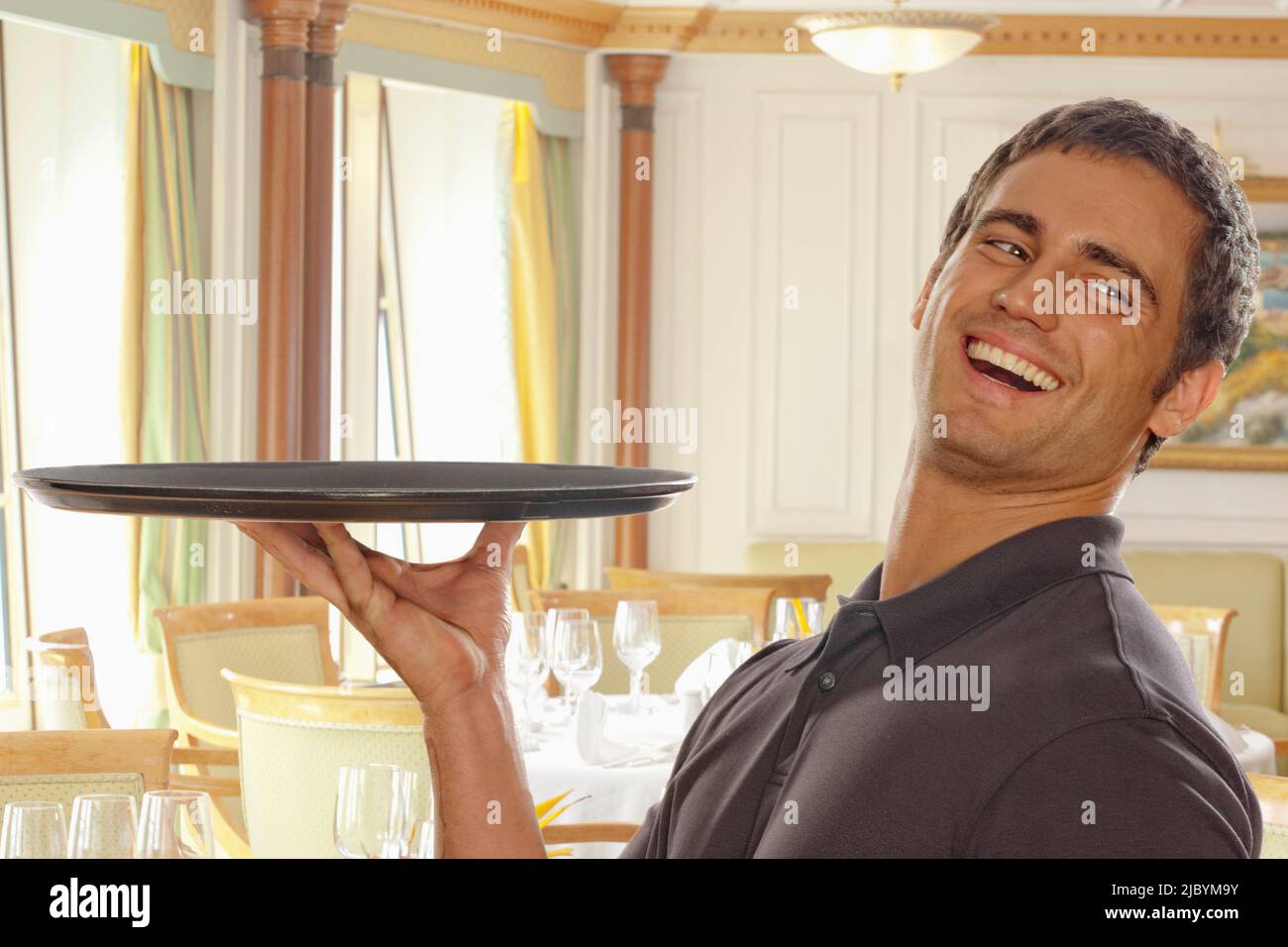 Man carrying tray side view hi-res stock photography and images - Alamy