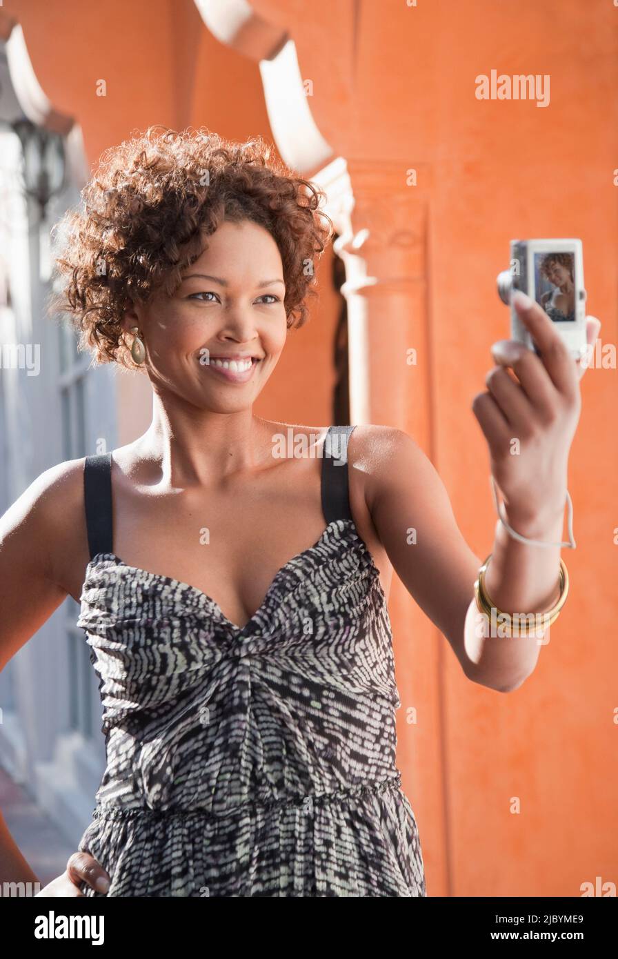 African American woman taking self-portrait Stock Photo - Alamy