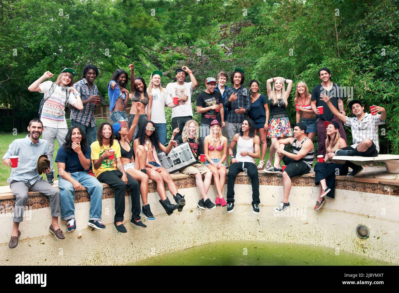 Asian guy hands behind the head hi-res stock photography and images - Alamy