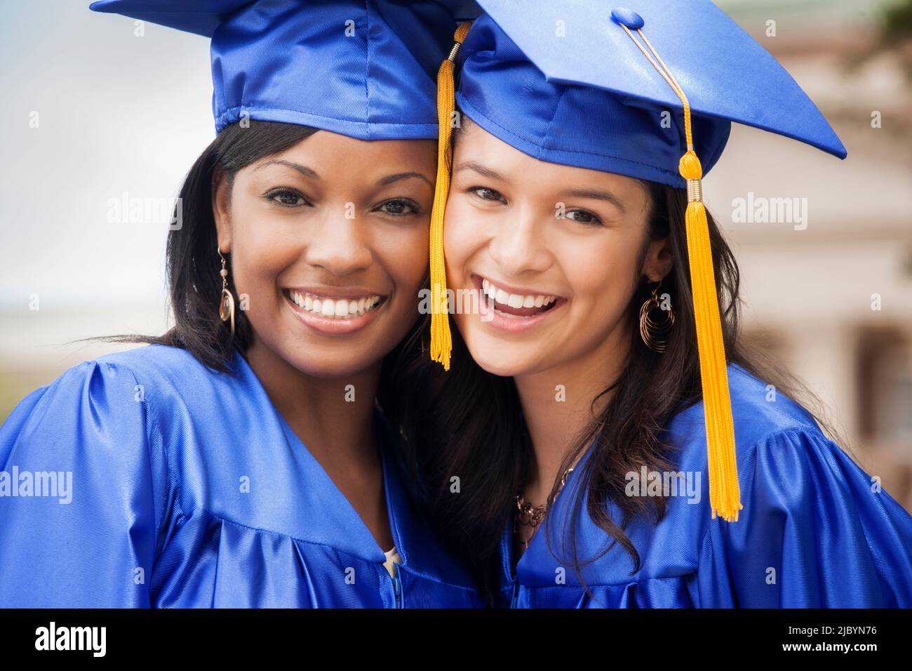 College graduates smiling together Stock Photo - Alamy