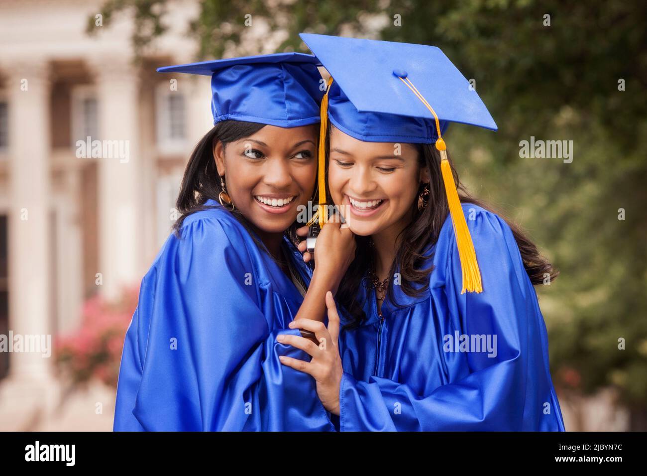 College graduates smiling together Stock Photo - Alamy