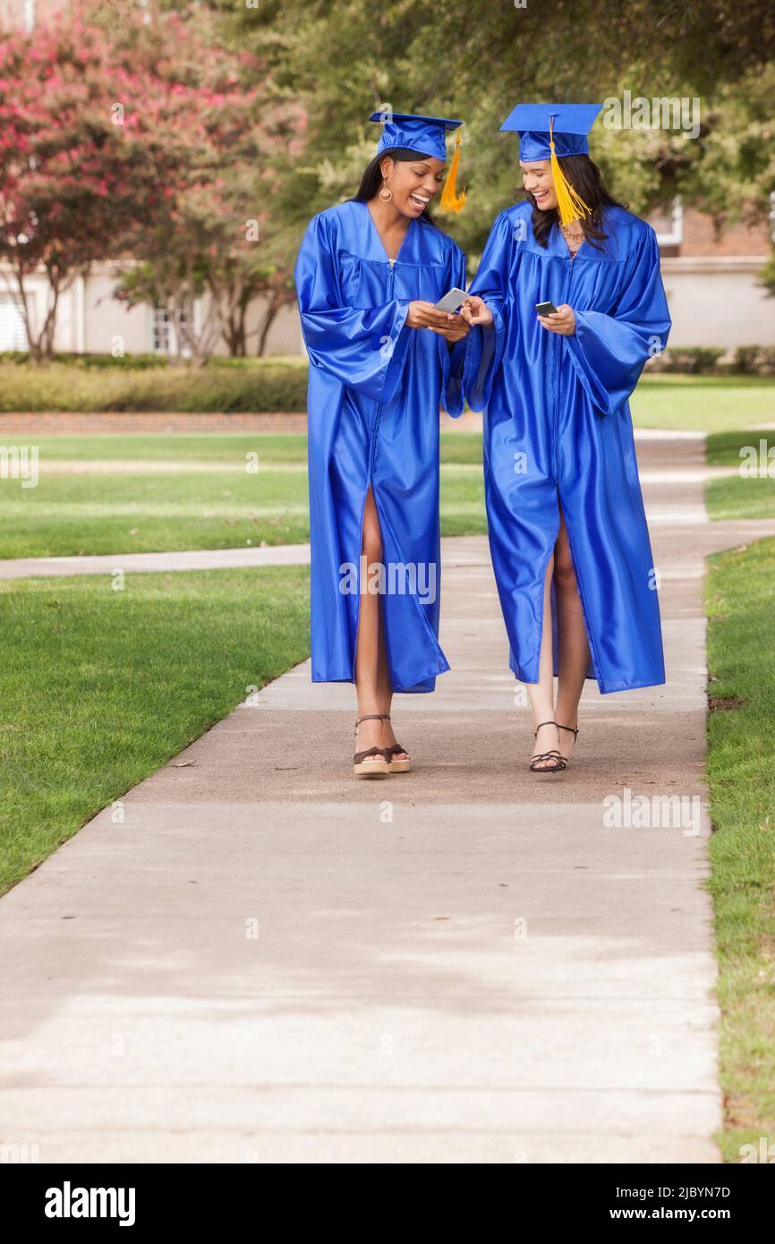 College graduates walking on campus Stock Photo - Alamy