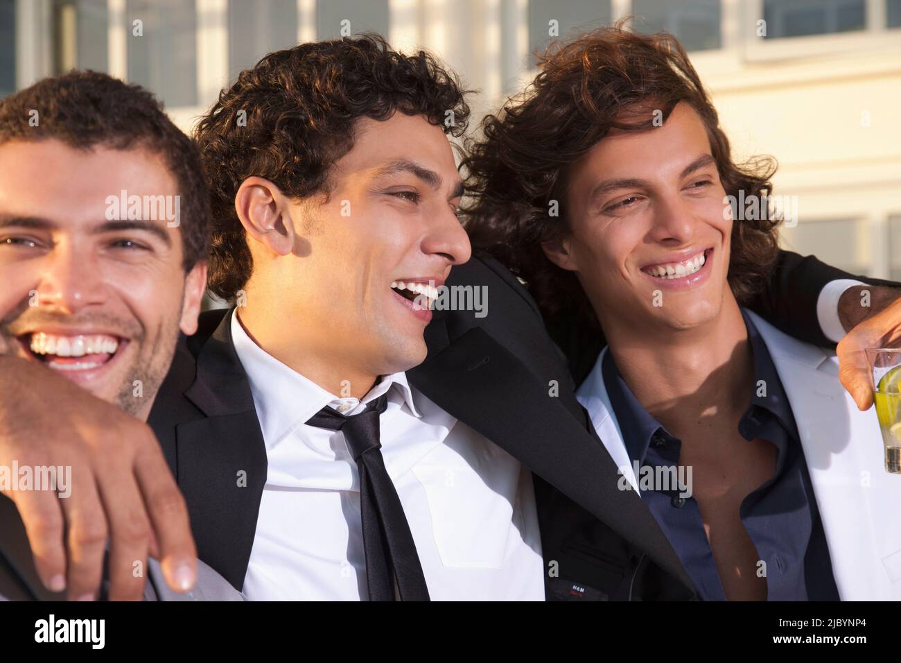 Men relaxing together at party Stock Photo - Alamy