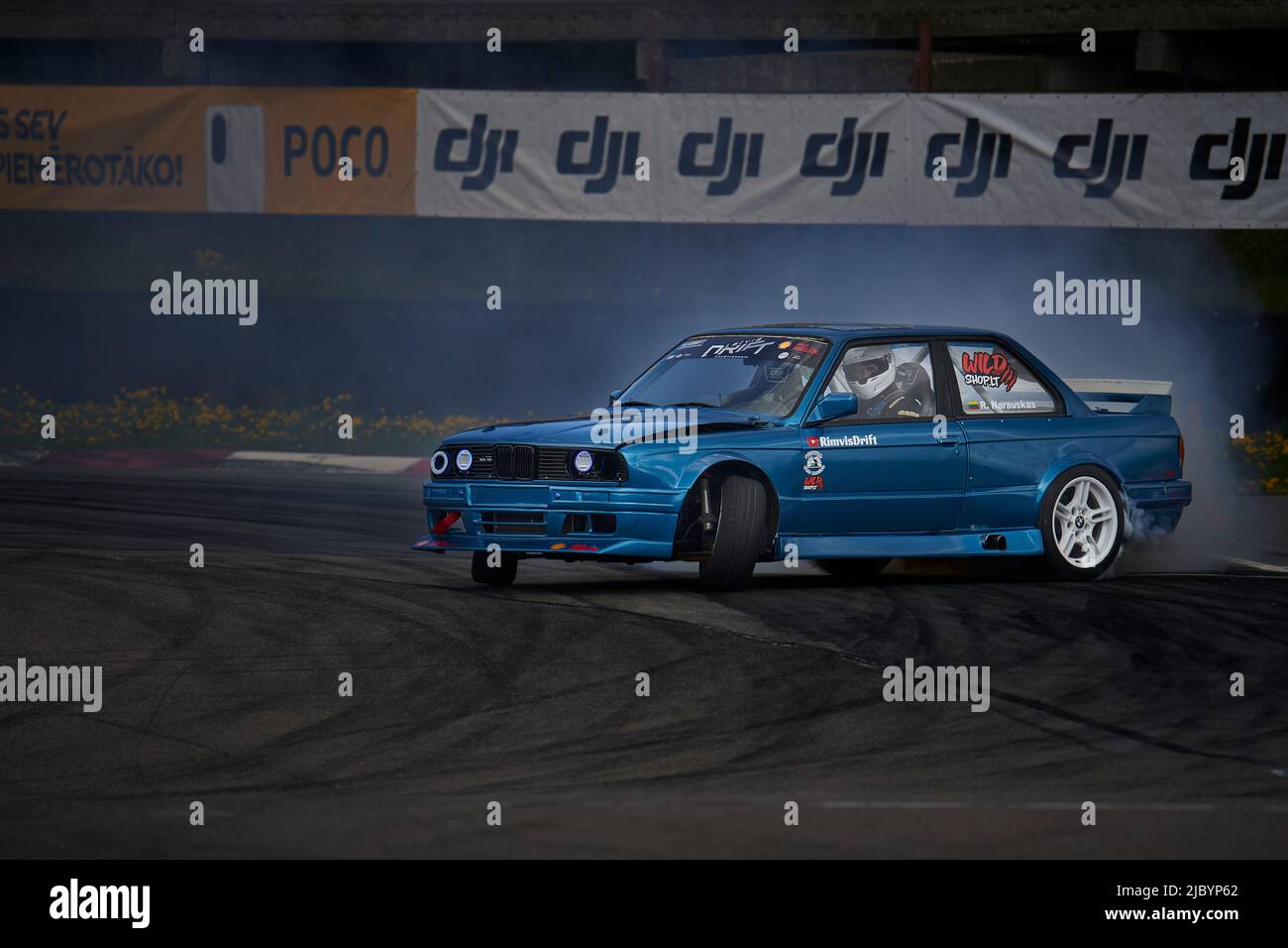 21-05-2022 Riga, Latvia car drifting on asphalt racing track with lot ...