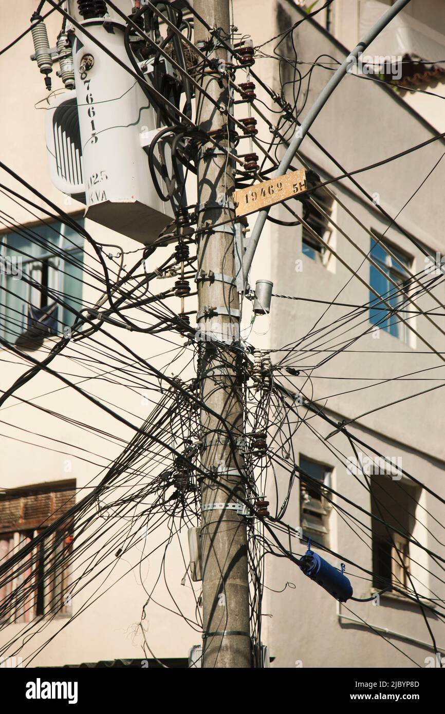 Power lines on city pole Stock Photo - Alamy