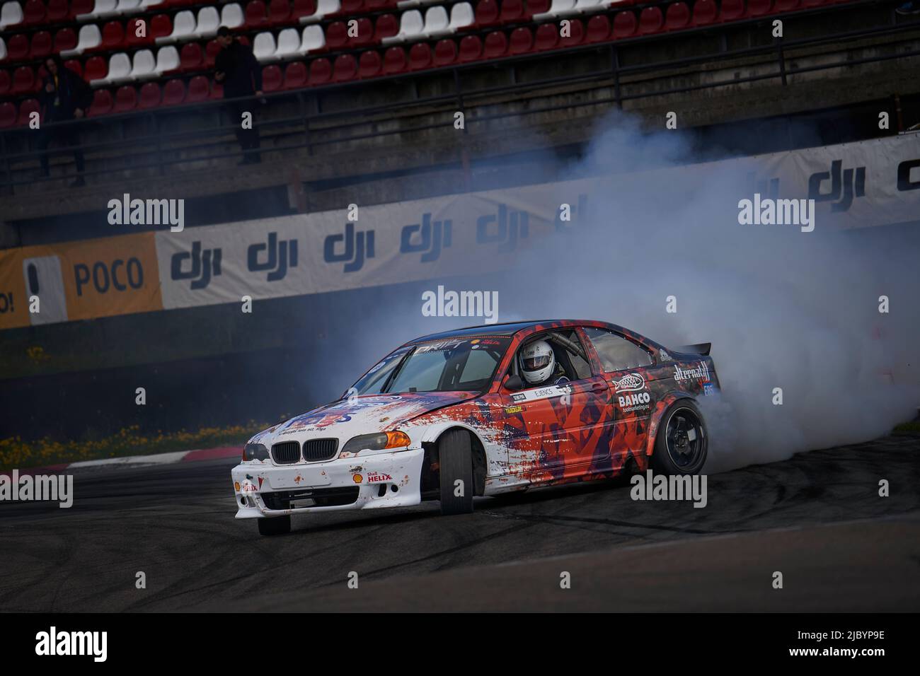 21-05-2022 Riga, Latvia car drifting on asphalt racing track with lot ...