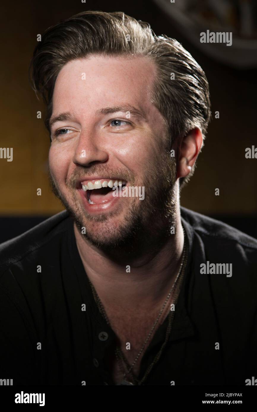 Man cheesy smile hi-res stock photography and images - Alamy