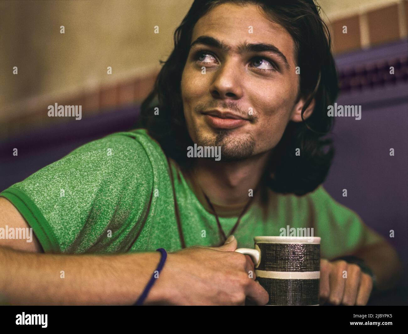 Man drinking coffee in cafe Stock Photo - Alamy