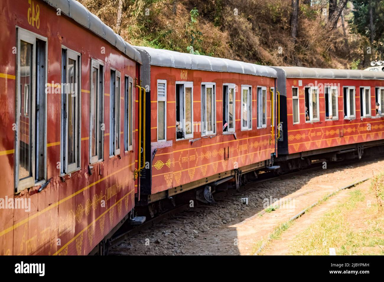 Toy Train moving on mountain slopes, beautiful view, one side mountain ...