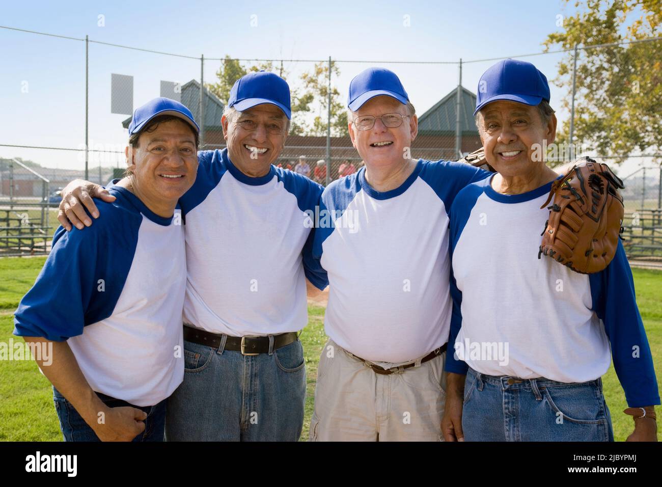 Senior men playing on baseball team Stock Photo - Alamy