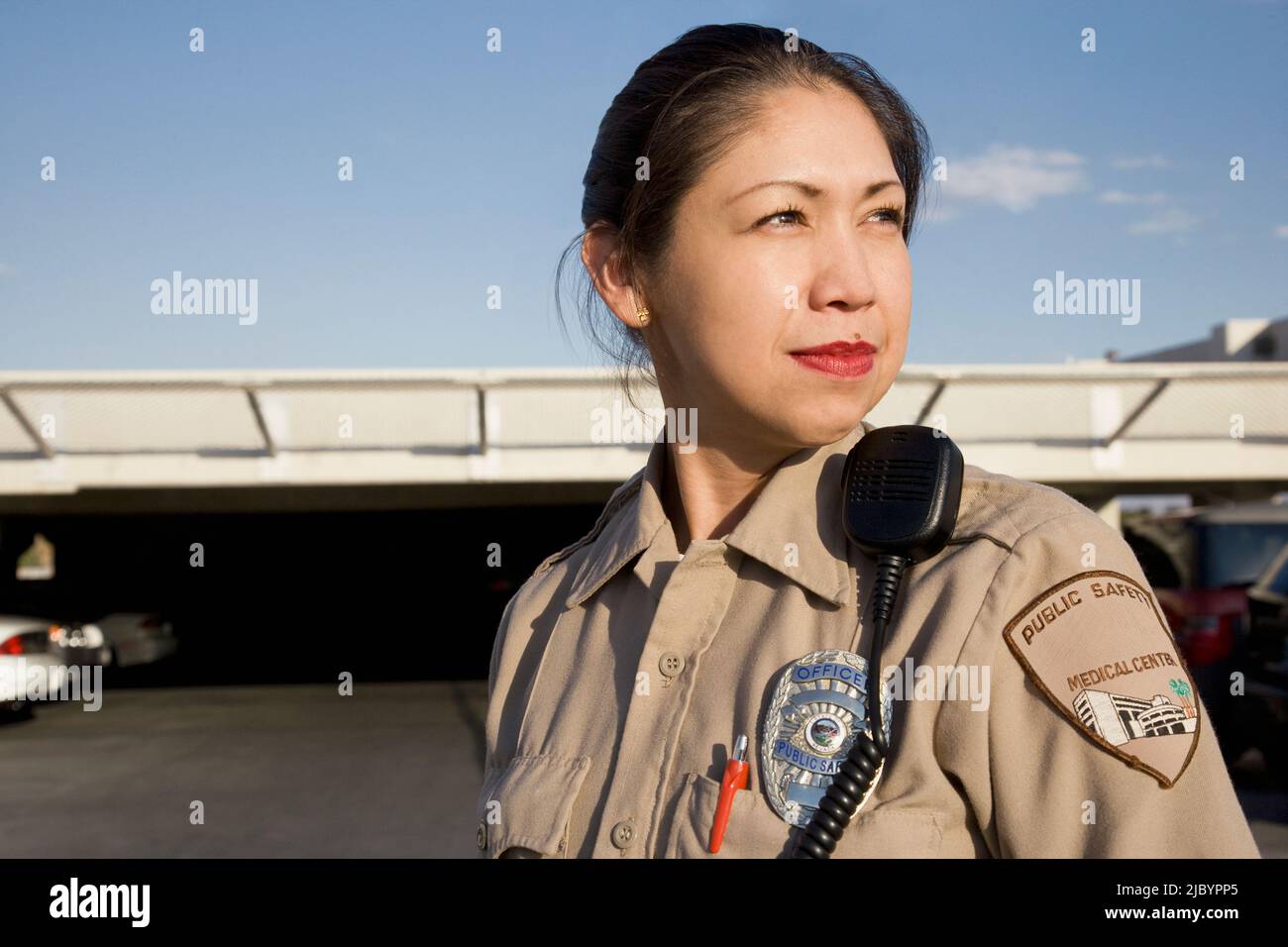 Female Hispanic security guard Stock Photo - Alamy