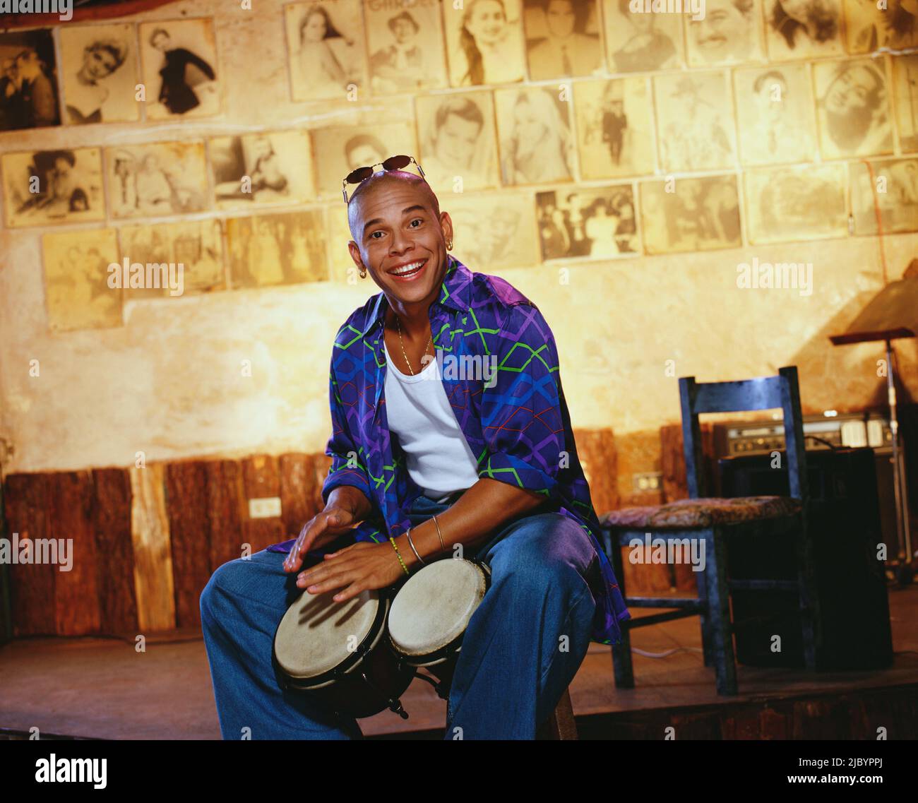 African man beating drum hi-res stock photography and images - Alamy