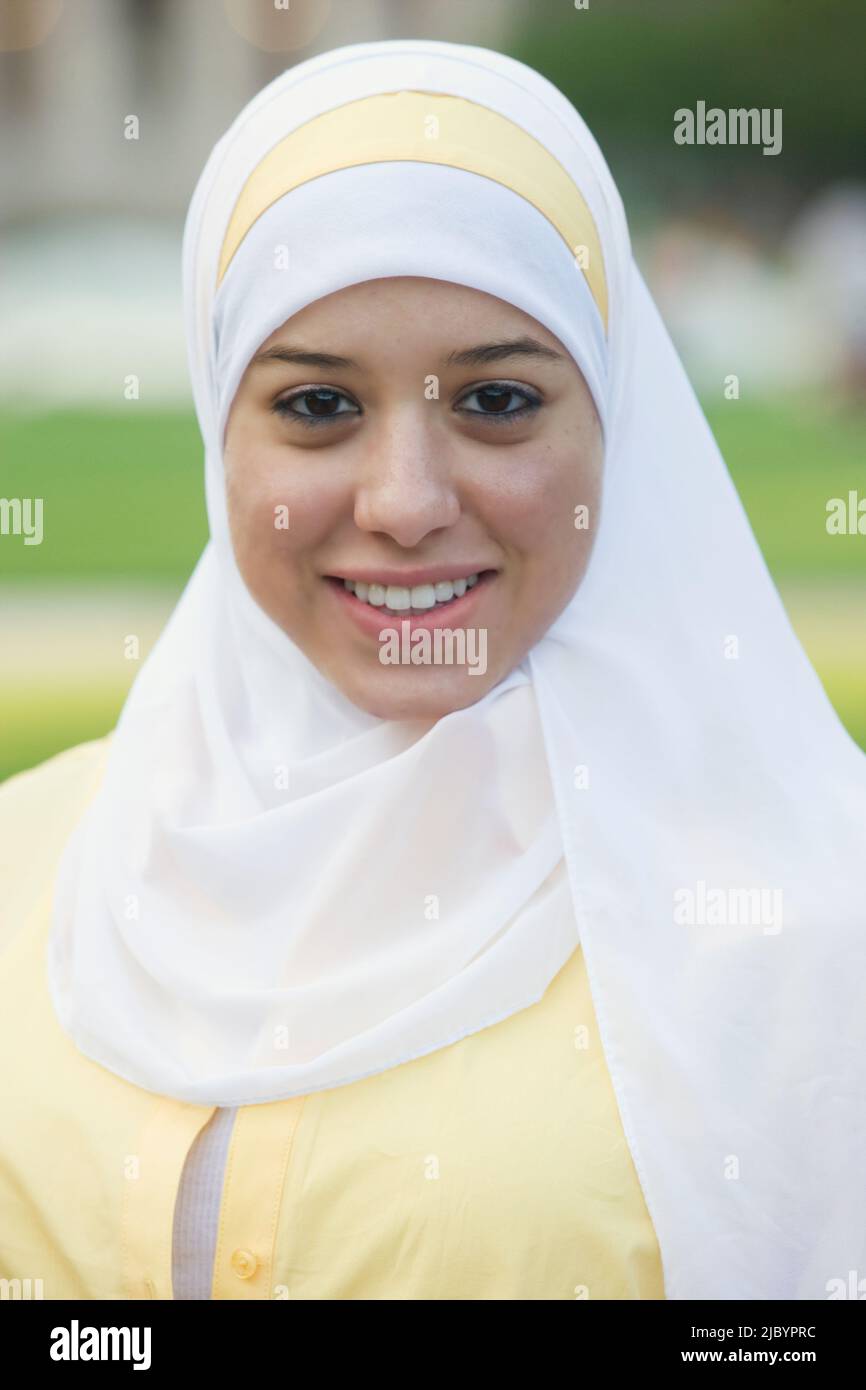 Self confident smiling muslim female hi-res stock photography and ...