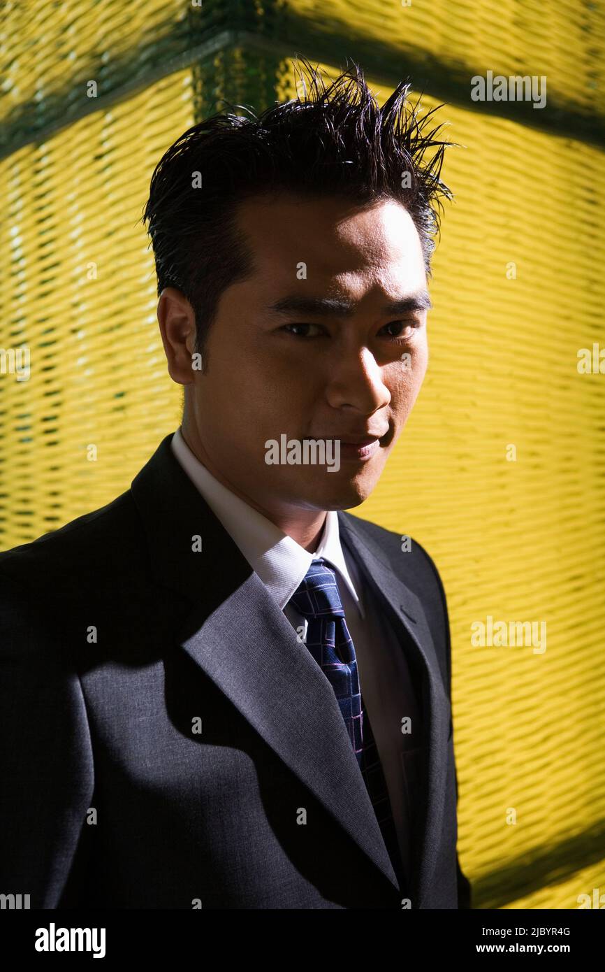 Chinese businessman smiling Stock Photo - Alamy