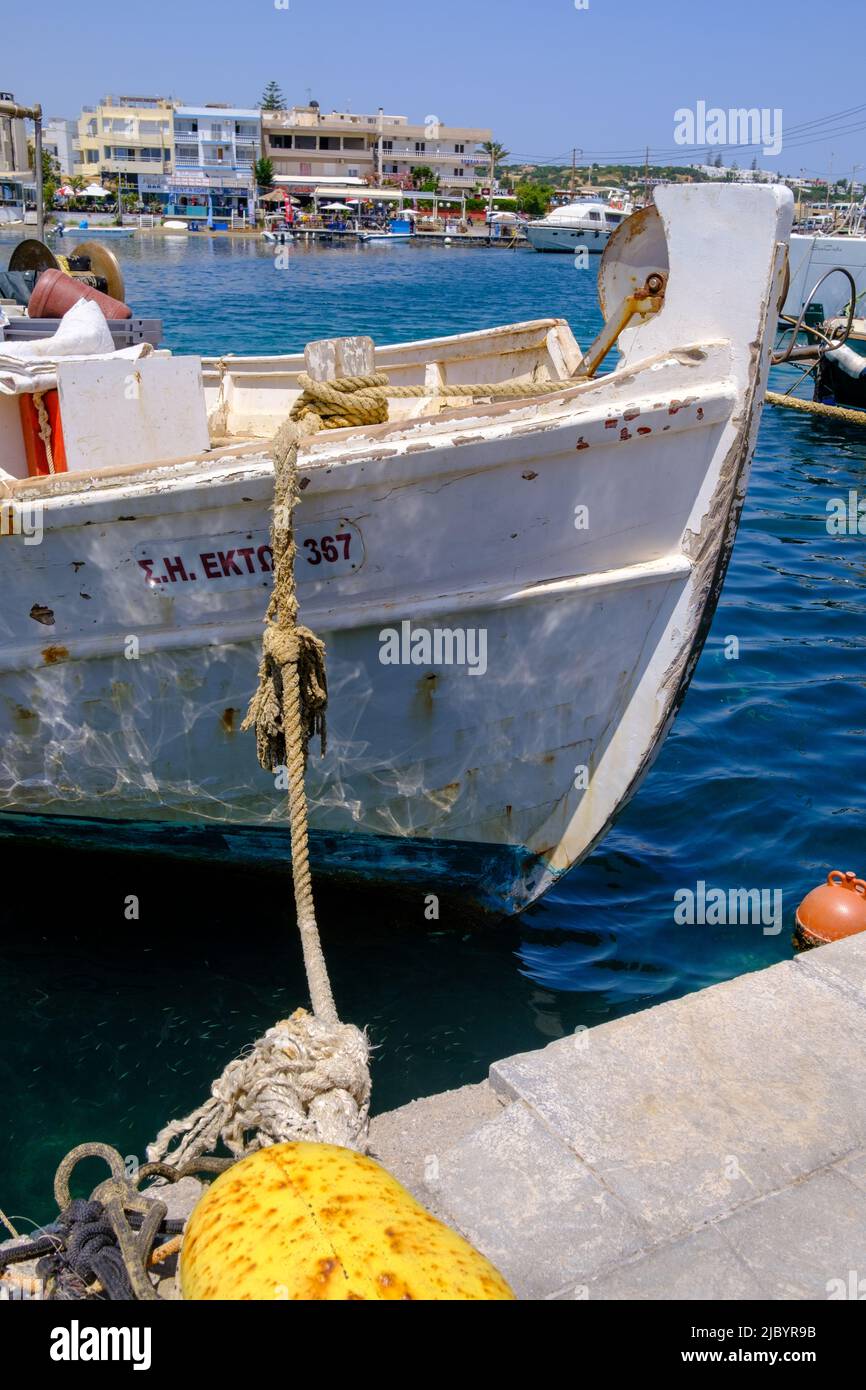 a greek fishing boat floats in the harbor of Chersonisos Stock Photo ...