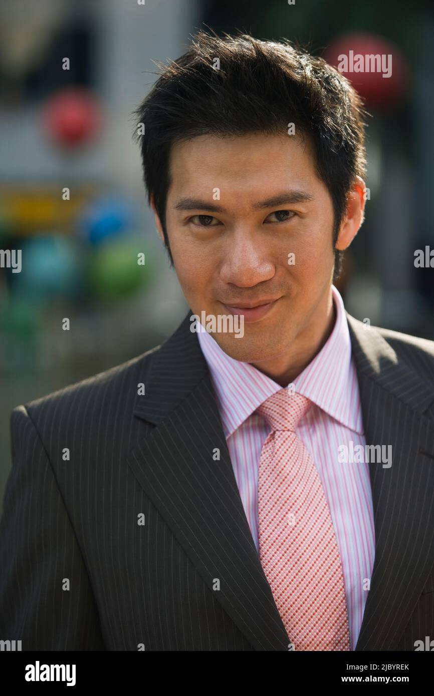 Chinese businessman smiling Stock Photo - Alamy