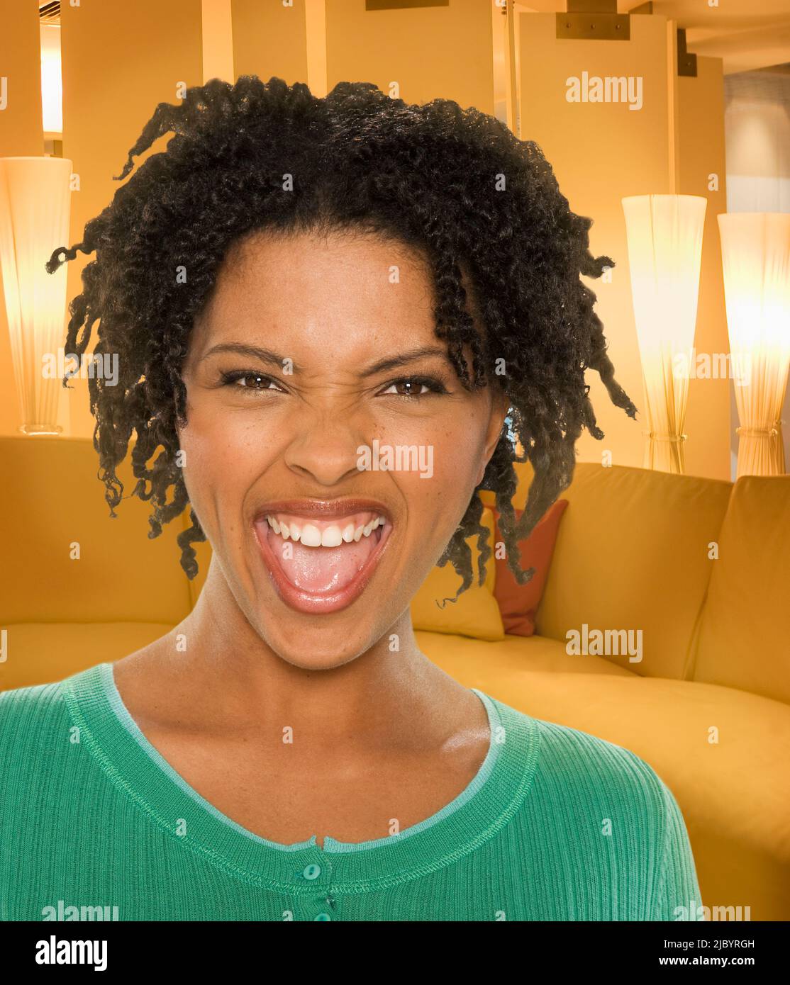 Laughing African American woman Stock Photo - Alamy