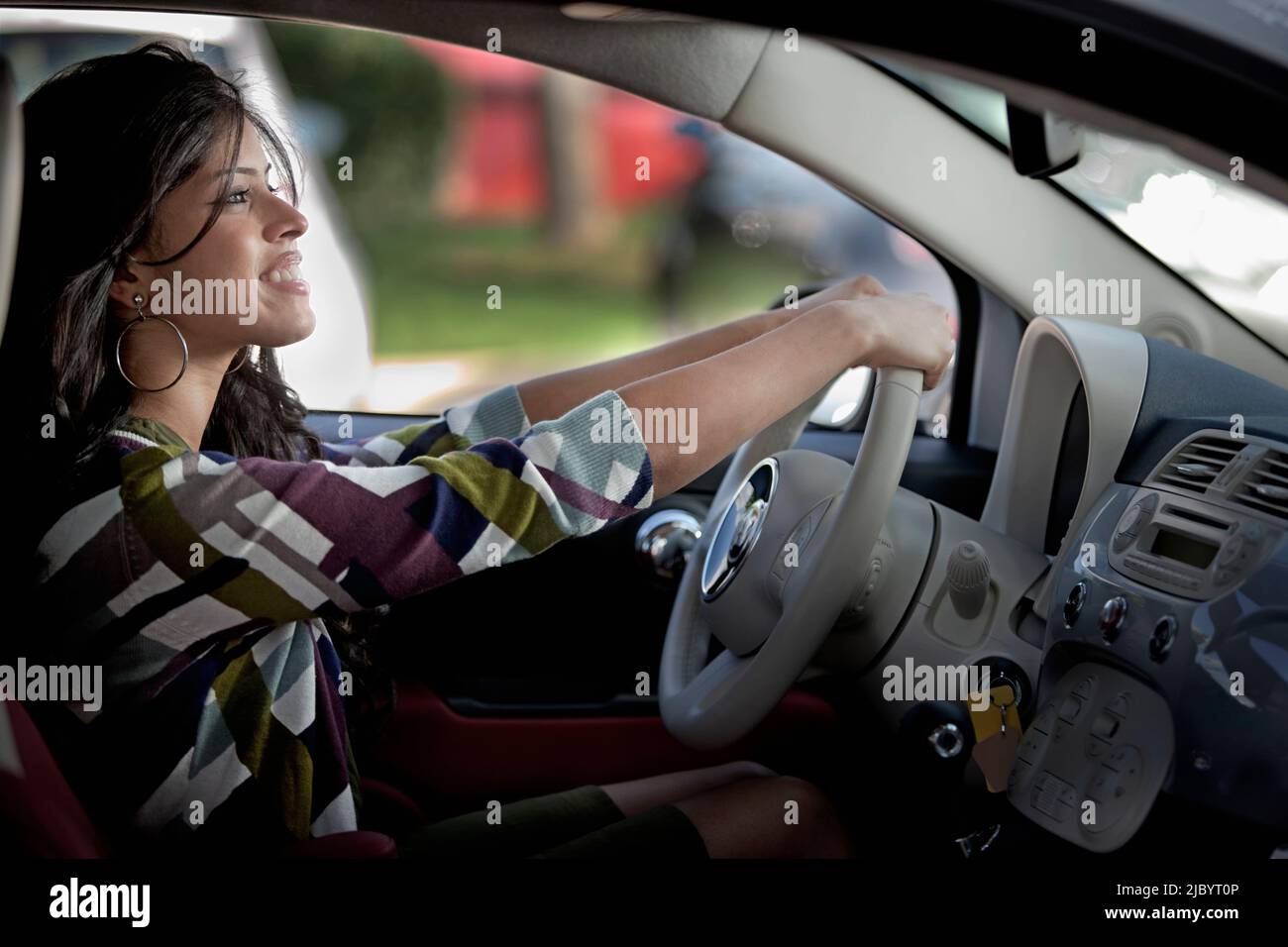 Indian woman driving car Stock Photo - Alamy