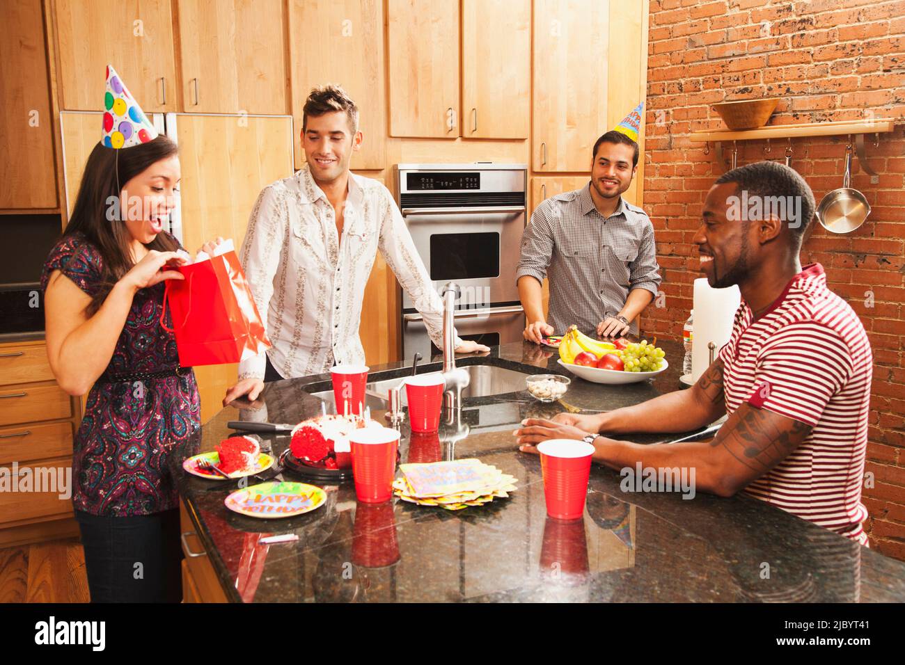 Female friends open gift hi-res stock photography and images - Alamy