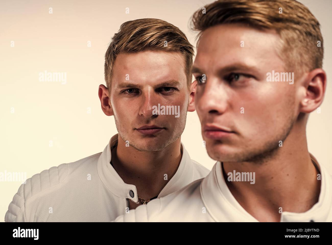 young twin brothers with similar appearance, twins Stock Photo - Alamy