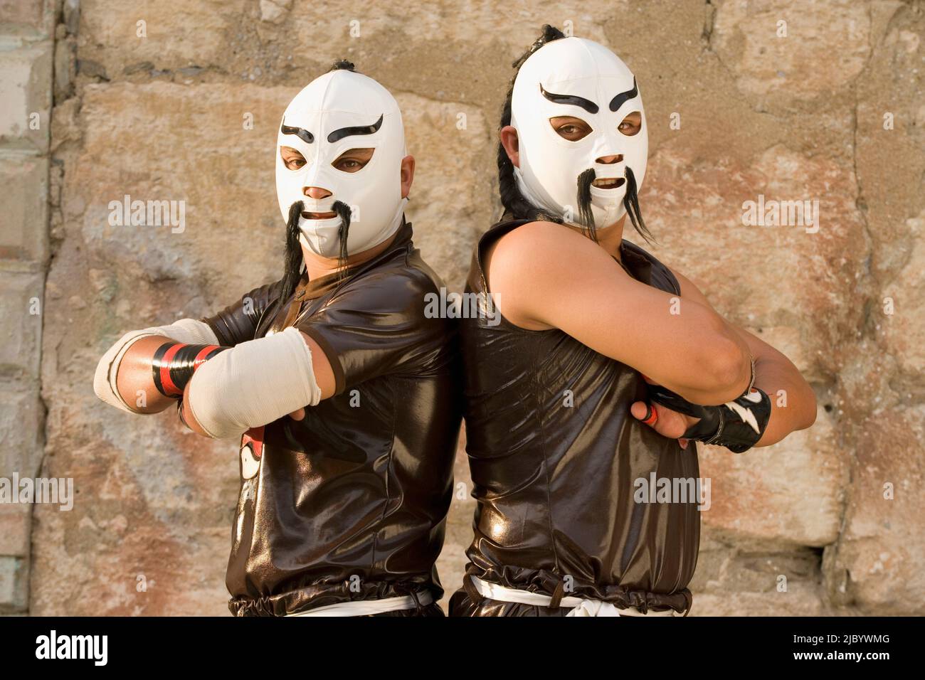 Hispanic men wearing Mexican wrestling costumes Stock Photo - Alamy