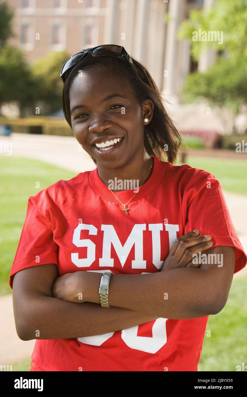 Smiling African American woman on college campus Stock Photo - Alamy