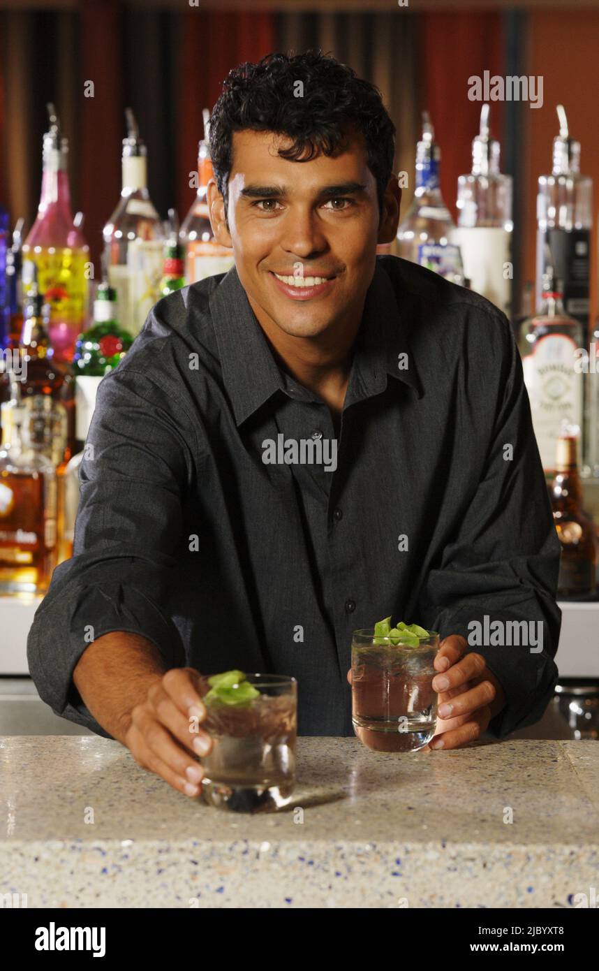 Bartender making front cocktail close hi-res stock photography and images - Alamy