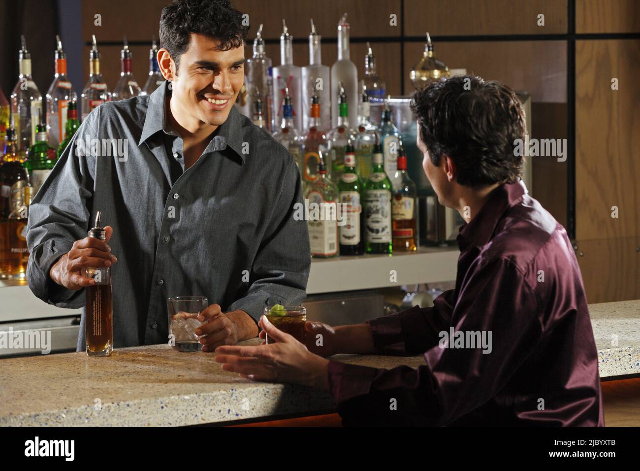 Conversation bartender hi-res stock photography and images - Alamy