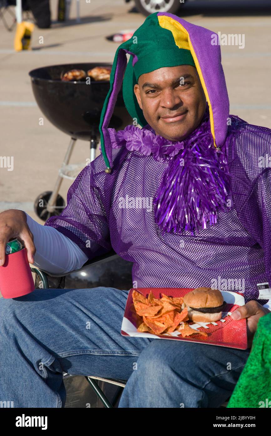 African male sports fan wearing team colors Stock Photo - Alamy