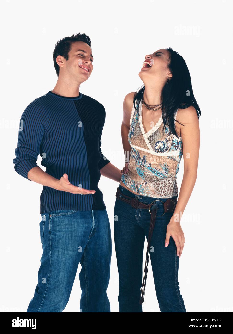 Young hispanic man holding two Cut Out Stock Images & Pictures - Alamy