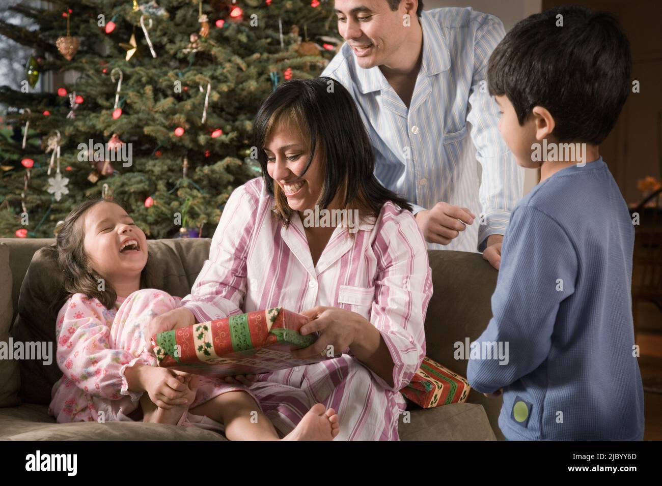 Boy giving gift to hispanic girl hi-res stock photography and images ...