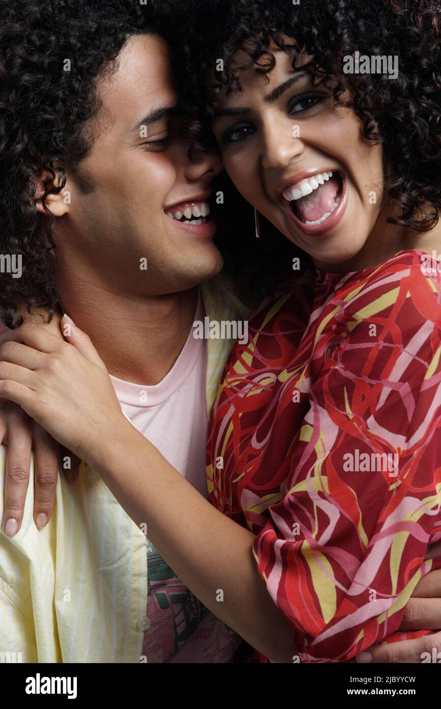 Two latina women hugging hi-res stock photography and images - Alamy