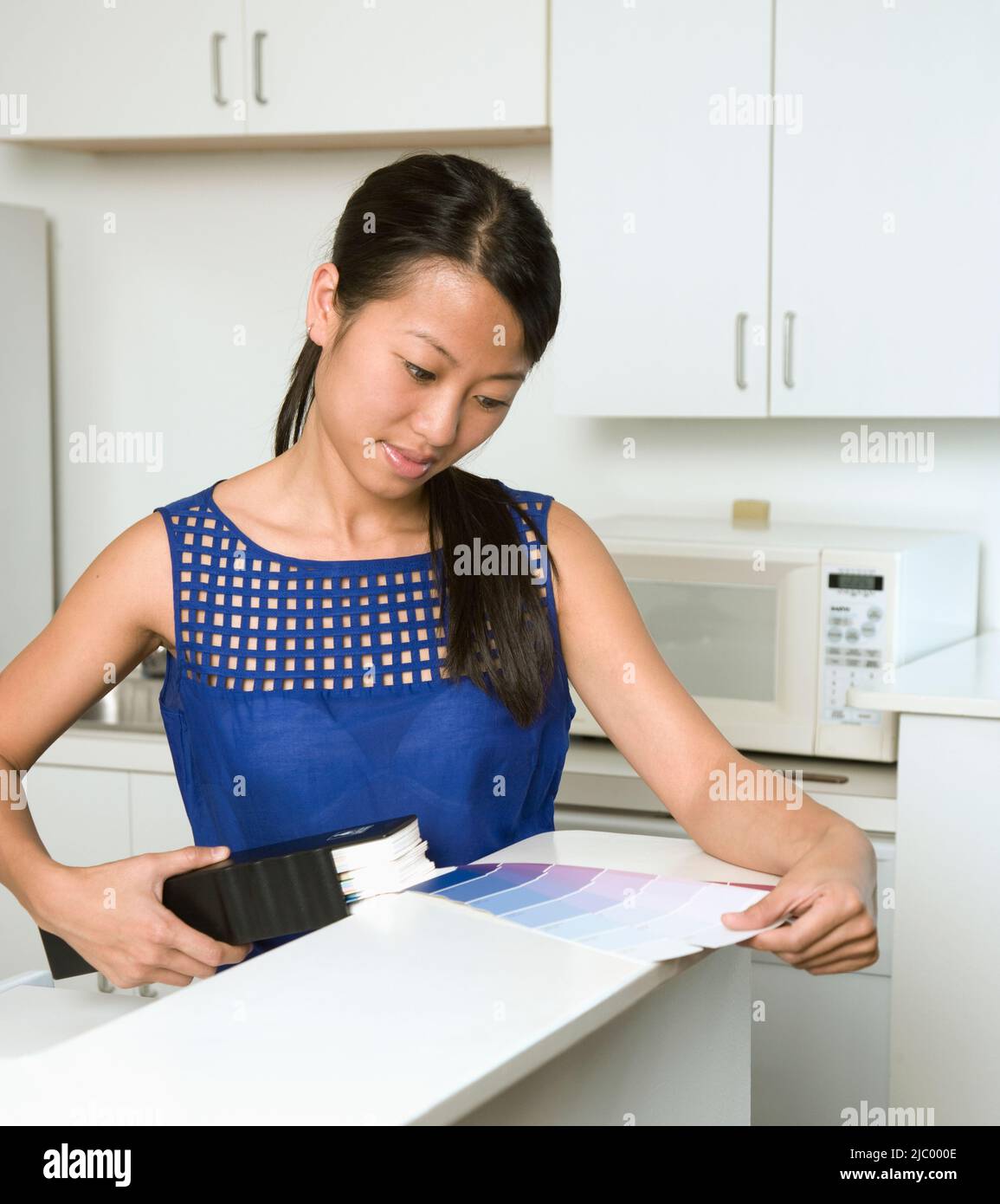 Woman designing indoors color swatches hi-res stock photography and images - Alamy