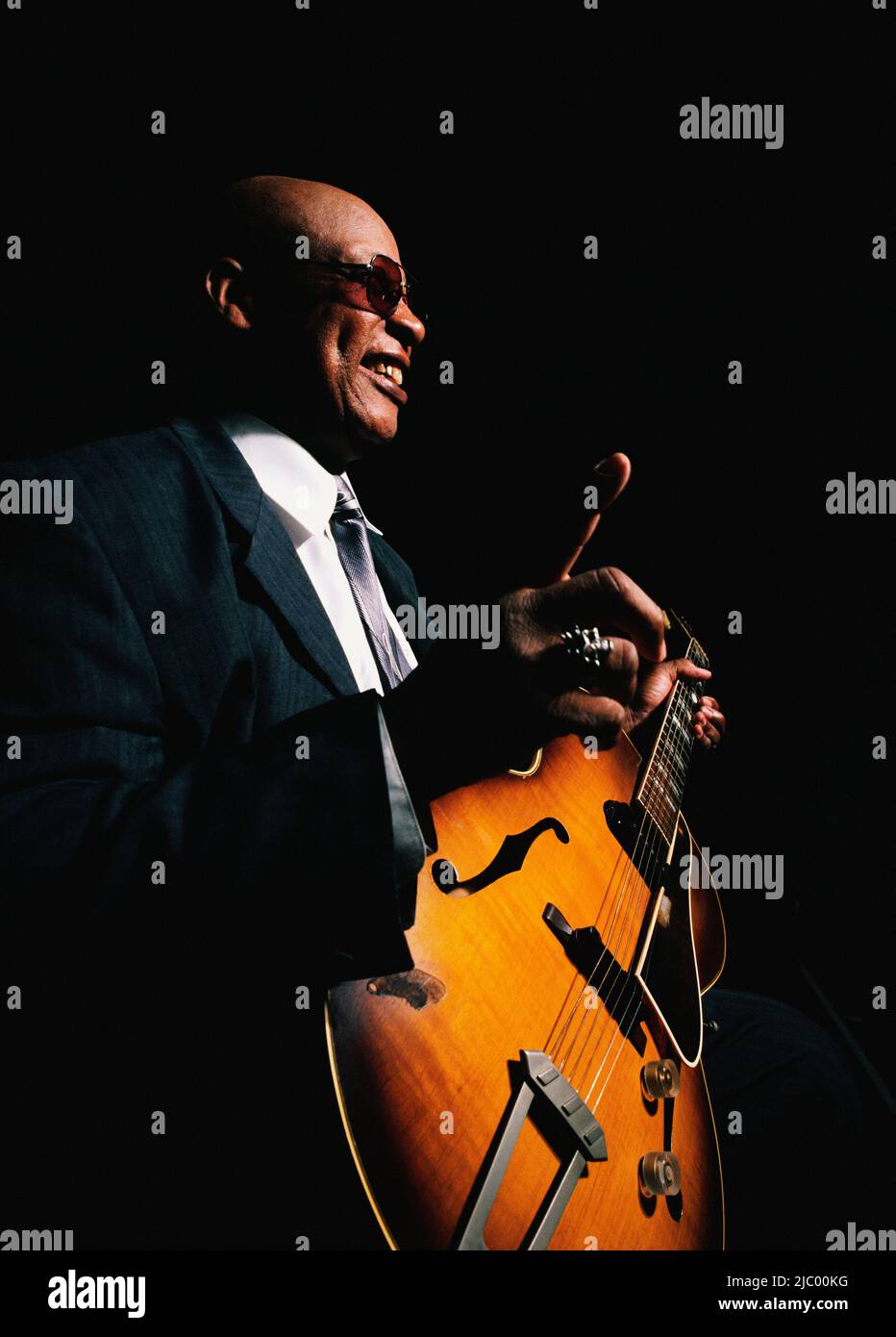 African American man with guitar Stock Photo - Alamy